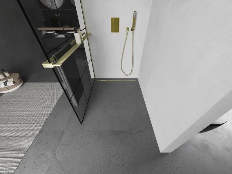 Mexen Kioto+ L, sprchová zástěna Walk-In s poličkou a věšákem 120 x 200 cm, 8mm čiré sklo černý vzor, ​​zlatý matný profil, 800-120-123-55-77