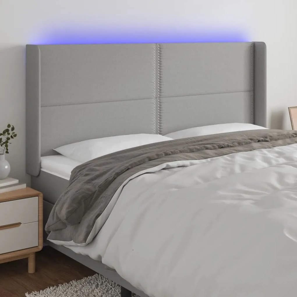 Čelo postele s LED světle šedé 183x16x118/128 cm textil 3123922