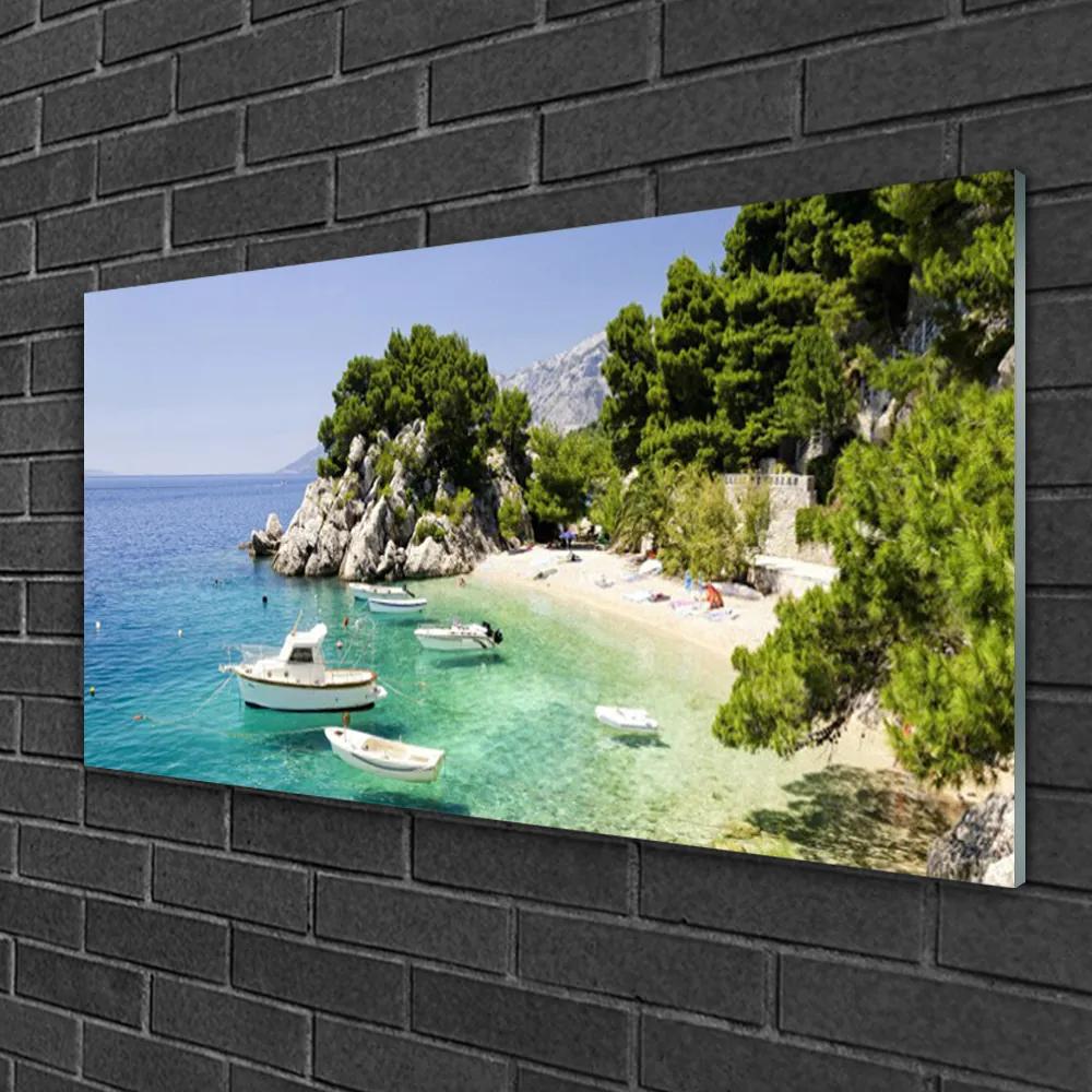 Obraz na skle Moře Pláž Skály Lodě 140x70 cm
