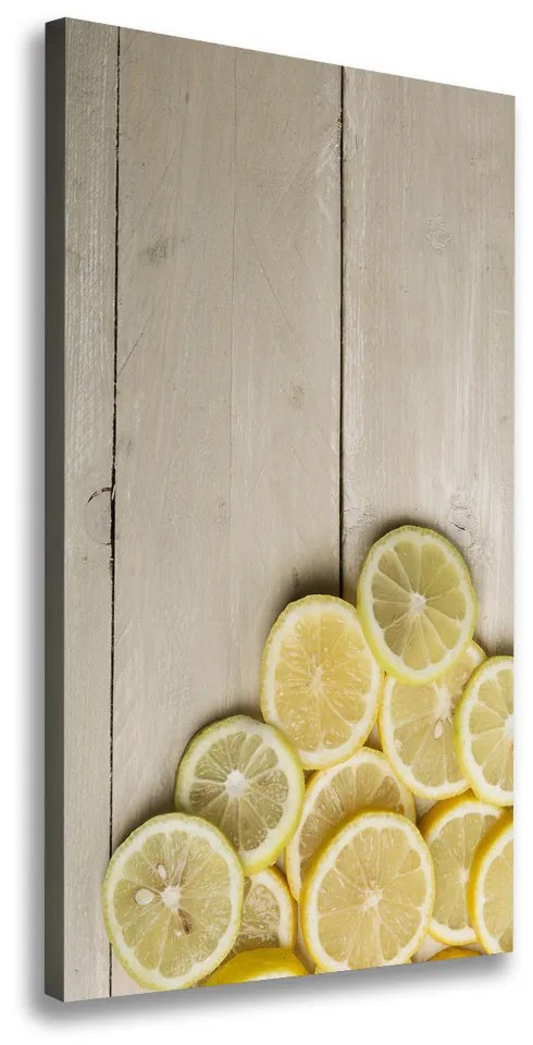 Wallmuralia Vertikální Foto obraz na plátně Citrony na dřevě 50x100