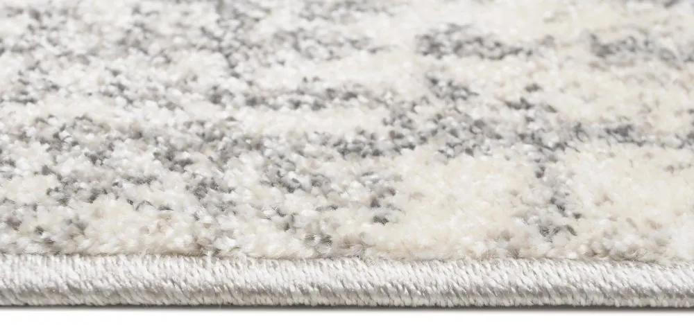 Krémový designový koberec se světle šedým vzorem Šířka: 120 cm | Délka: 170 cm