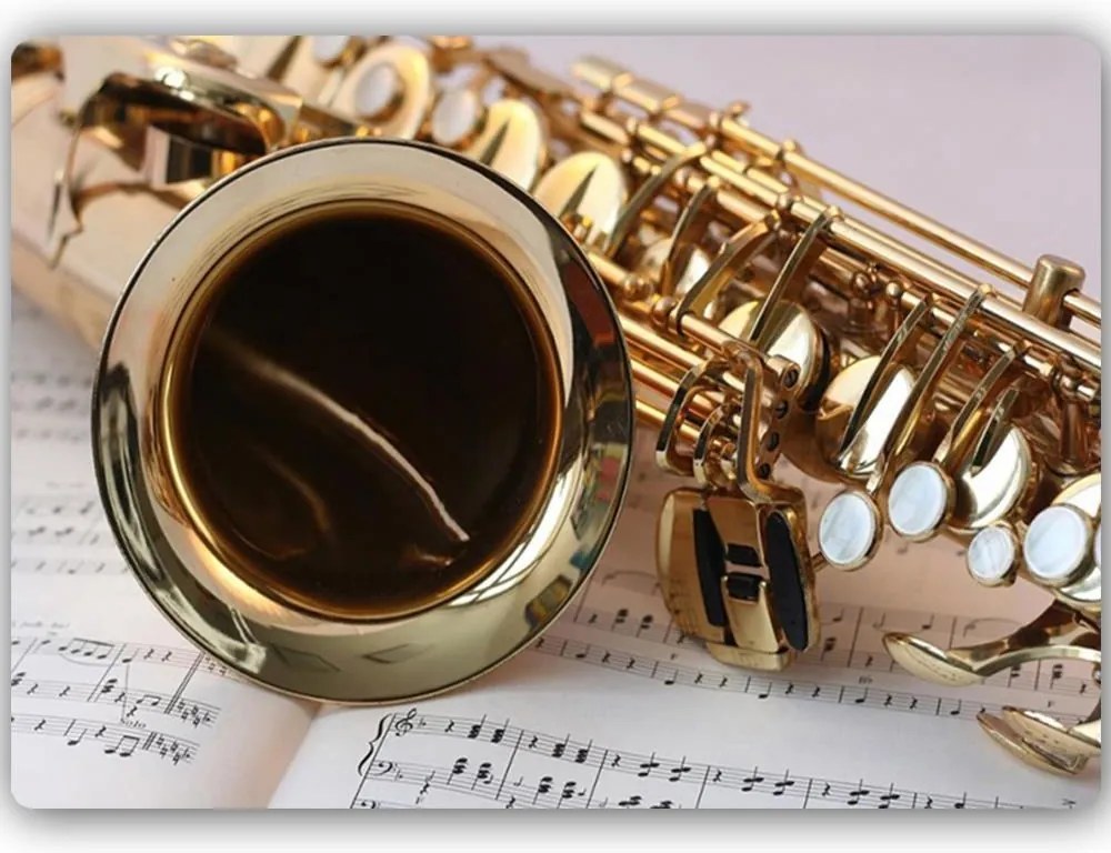 CARO Kovový obraz - Saxophone On Sheet Music 60x40 cm