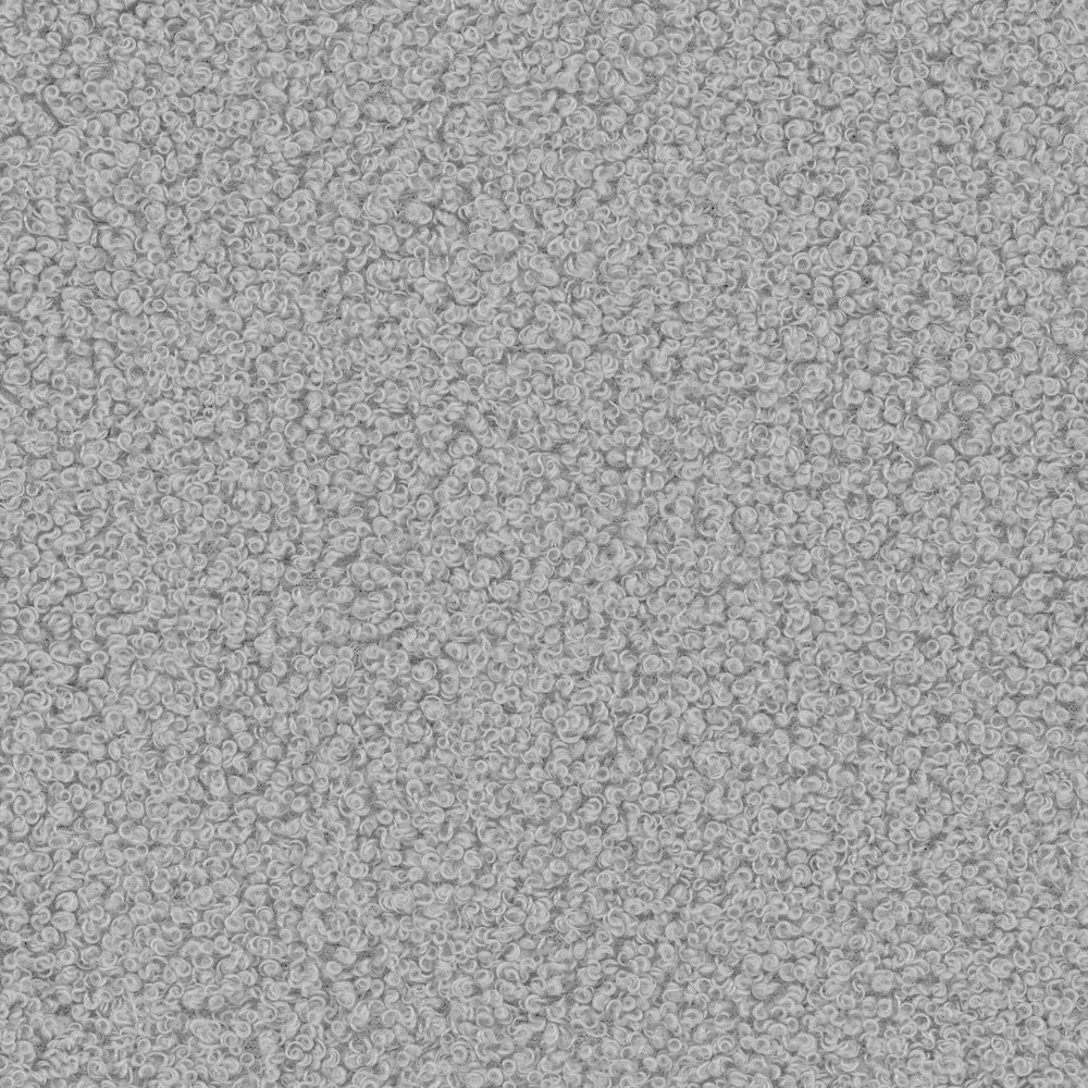 Světle šedé křeslo z textilie bouclé Chuck – Micadoni Home