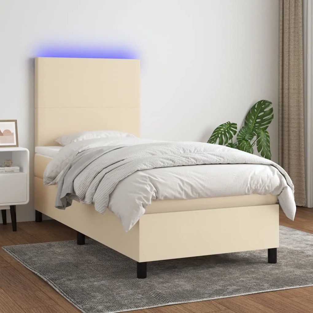 Box spring postel s matrací a LED krémová 90x200 cm textil