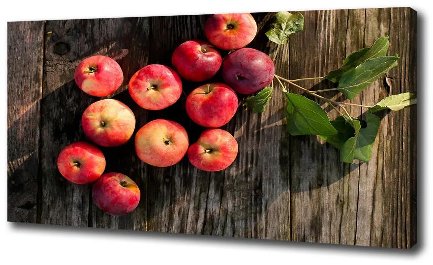 Wallmuralia Foto obraz na plátně Jablka na stole 100x50