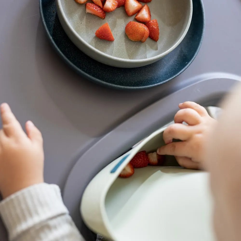 Lovi Silikonový bryndák s kapsou Pistachio