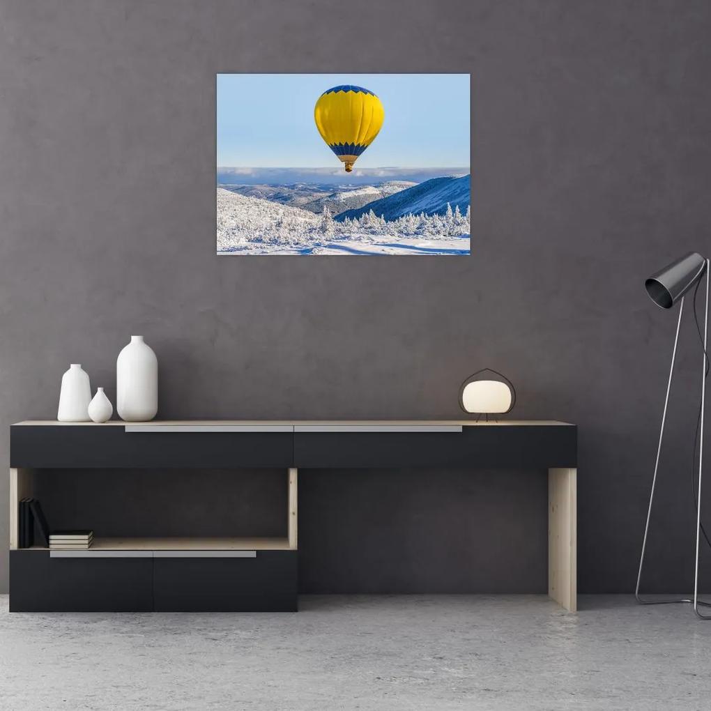 Skleněný obraz - Let nad zimní krajinou (70x50 cm)