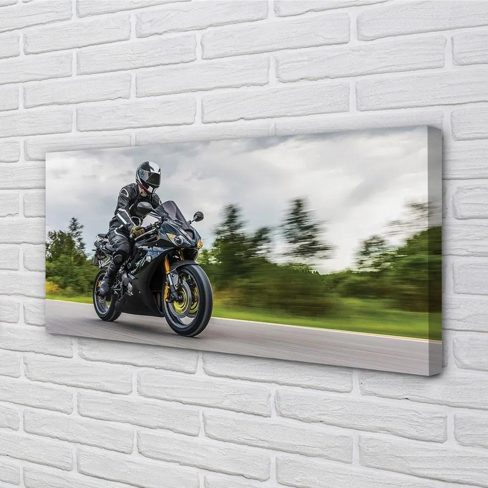 Obrazy na plátně Motocykl silnice mraky nebe 125x50 cm