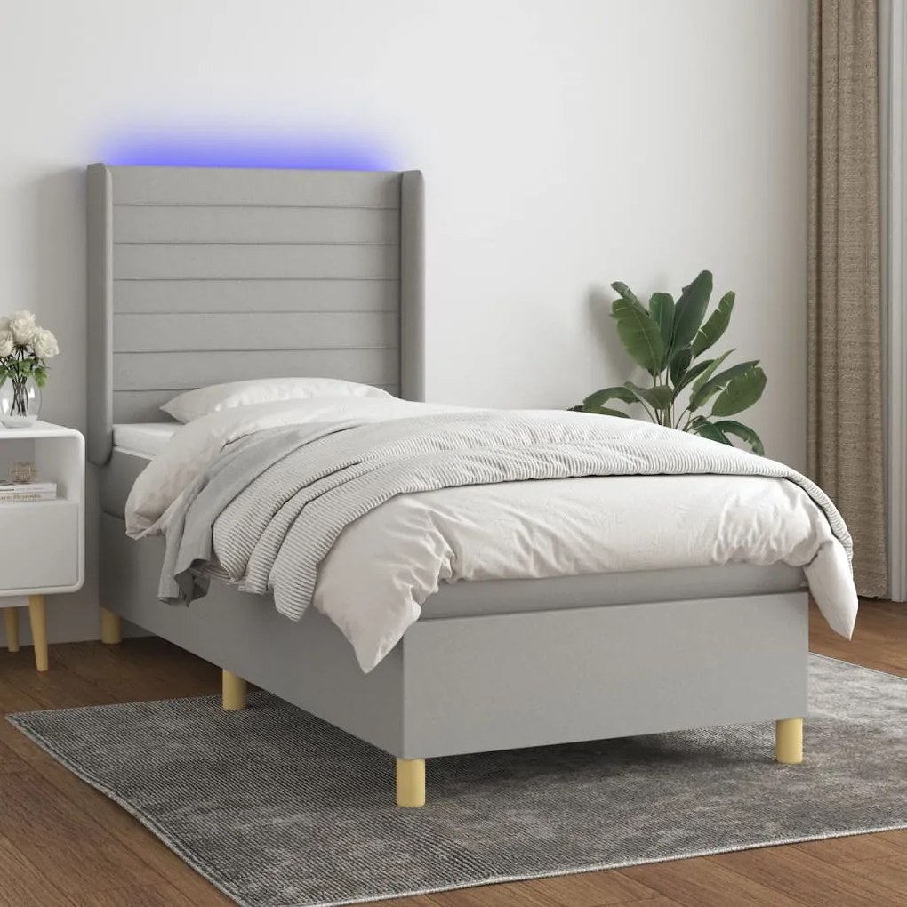 Box spring postel s matrací a LED světle šedá 90x200 cm textil