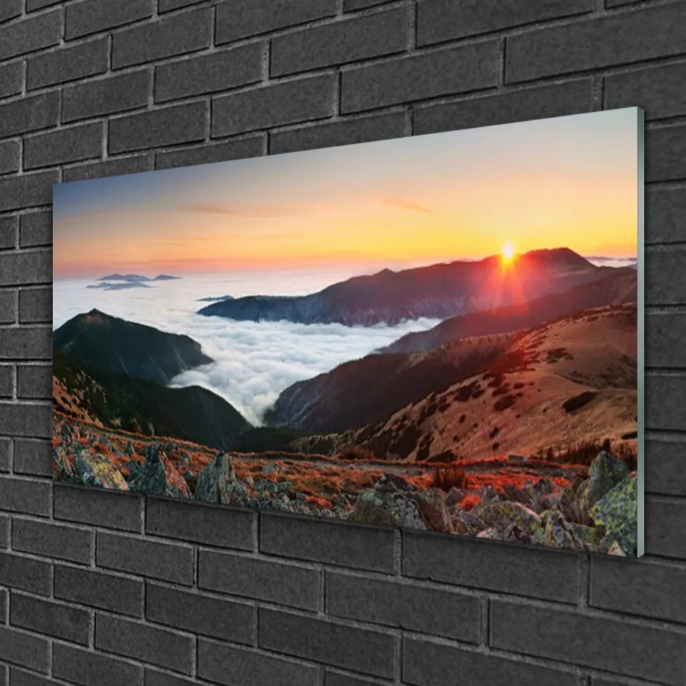 Obraz na skle Hory Mraky Slunce Krajina 140x70 cm