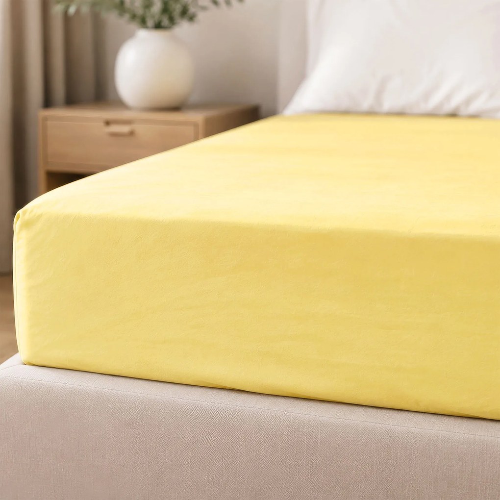Goldea bavlněné napínací prostěradlo - žluté 200 x 200 cm