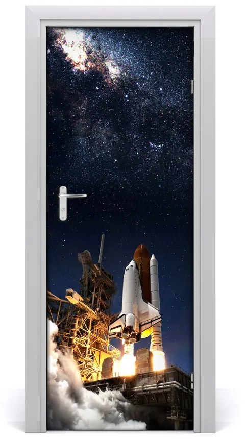 Fototapeta samolepící dveře startující raketa 75x205 cm