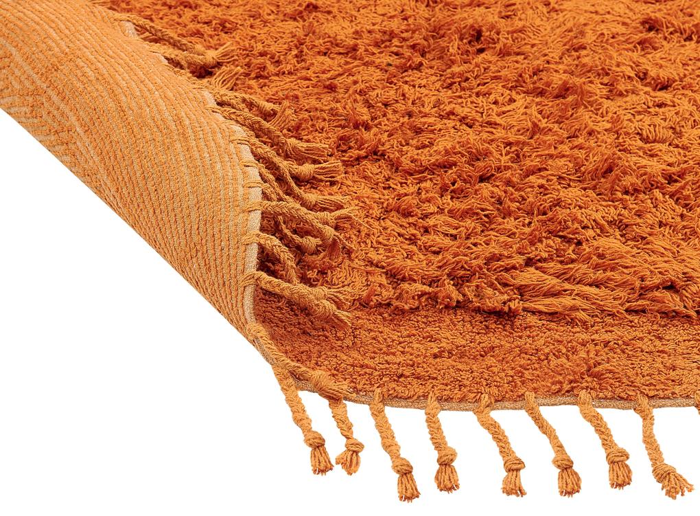 Kulatý bavlněný koberec ⌀ 140 cm oranžový BITLIS Beliani