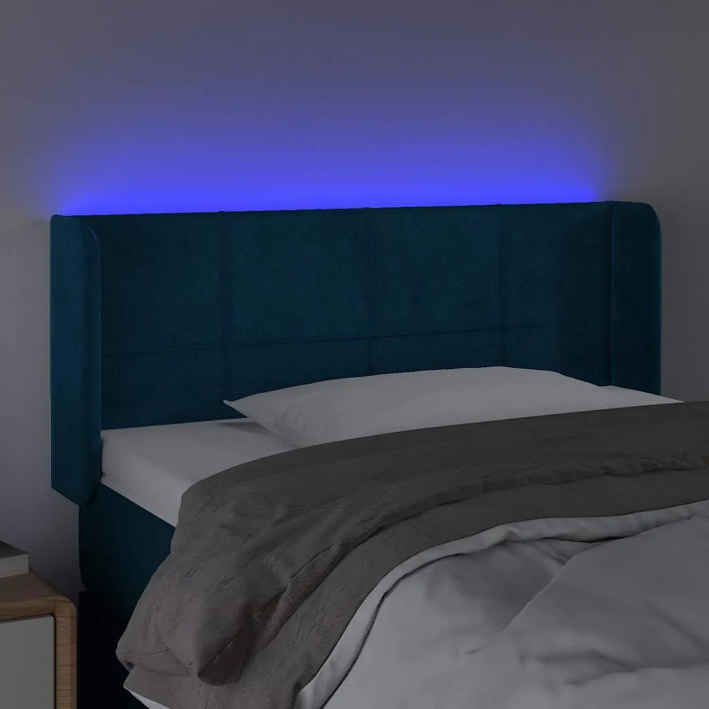 Čelo postele s LED tmavě modré 103 x 16 x 78/88 cm samet 3123282