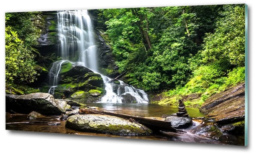 Wallmuralia Foto obraz skleněný horizontální Vodopád v lese 100x50