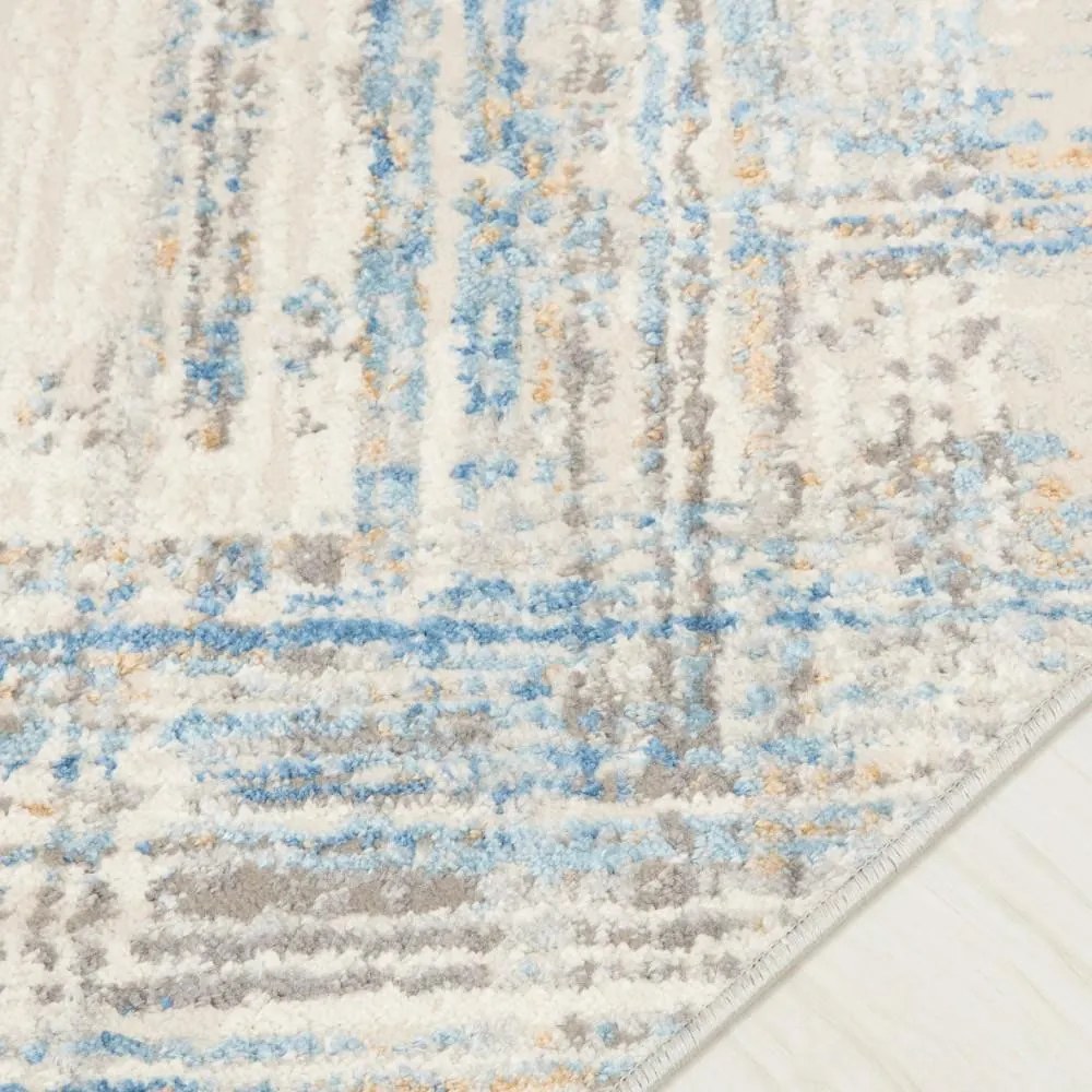 Kusový koberec Uranos krémově modrý 240x330cm