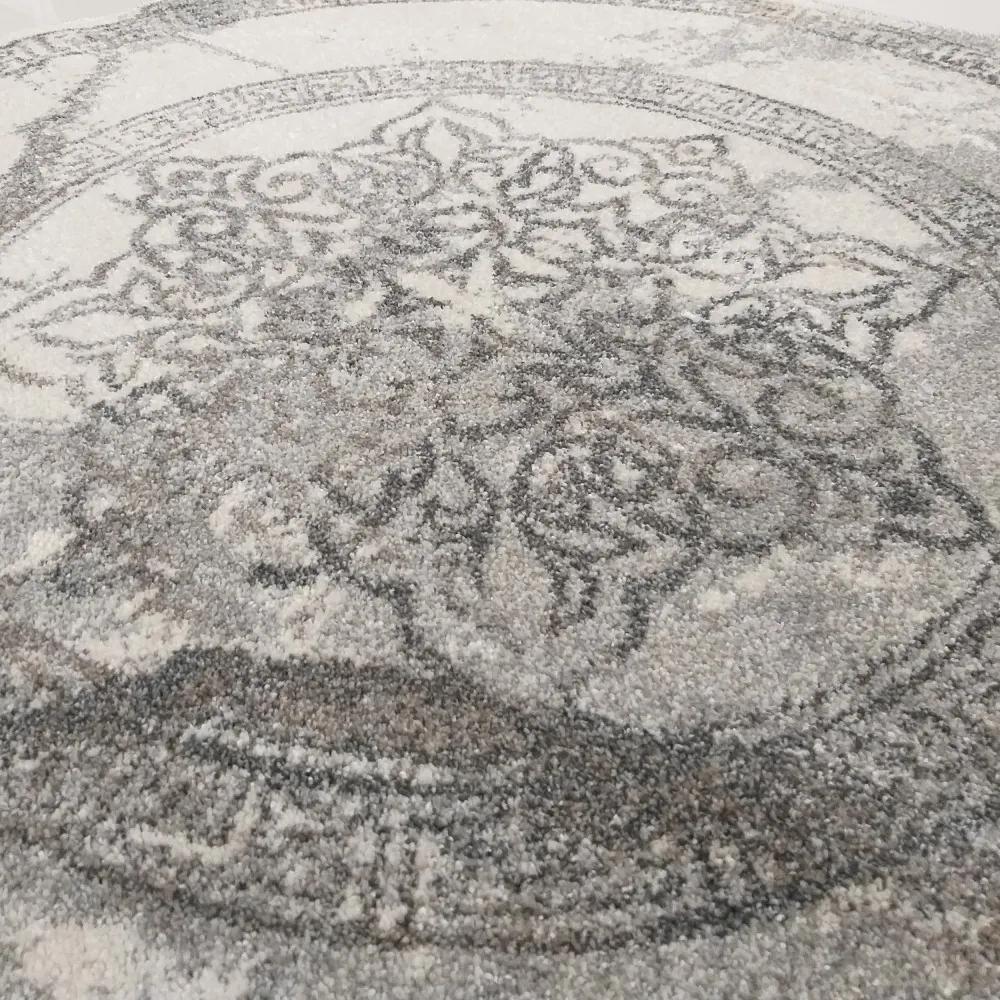 Stylový šedý kulatý koberec se vzorem mandaly