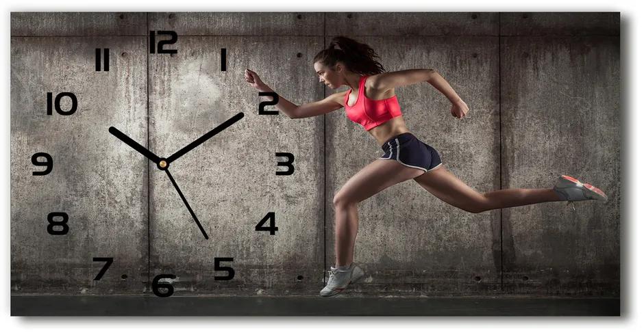 Wallmuralia Skleněné hodiny na stěnu Běžící žena 60x30 cm