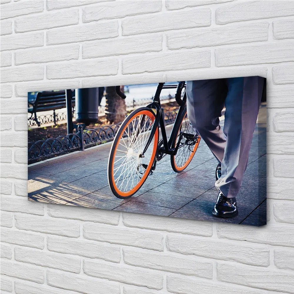 Obrazy na plátně Město na kole noha 100x50 cm