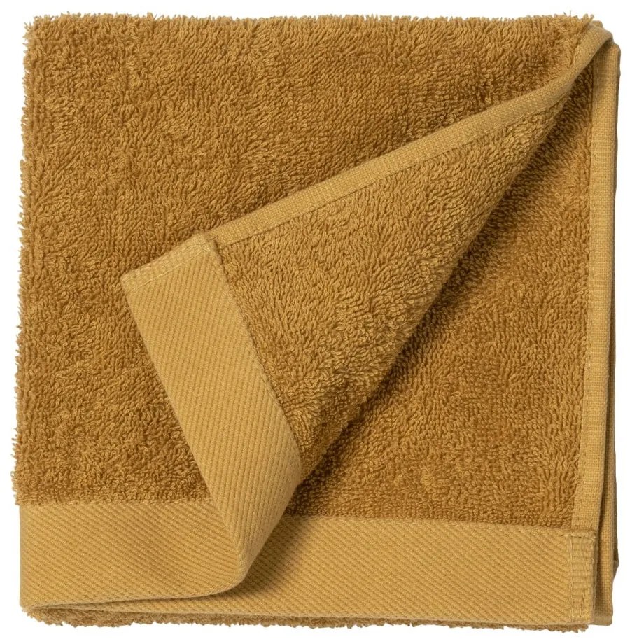 Žlutý ručník z froté bavlny Södahl Golden, 60 x 40 cm