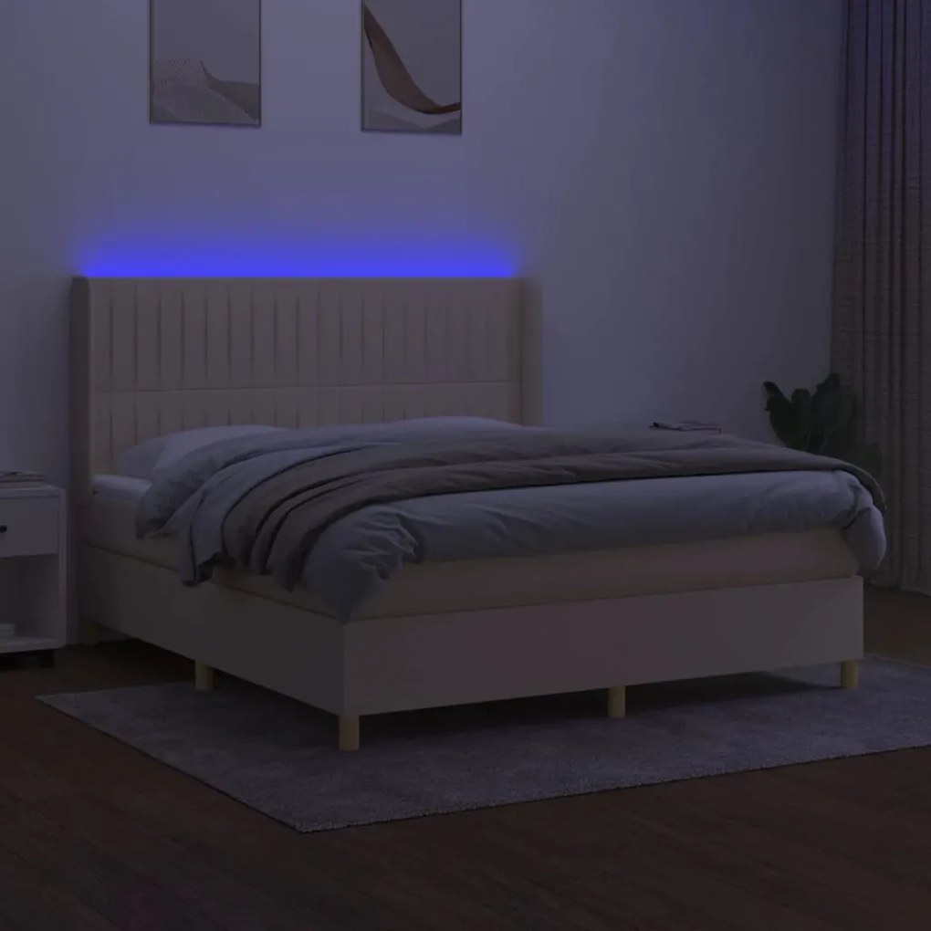 Box spring postel s matrací a LED krémová 180x200 cm textil 3139058