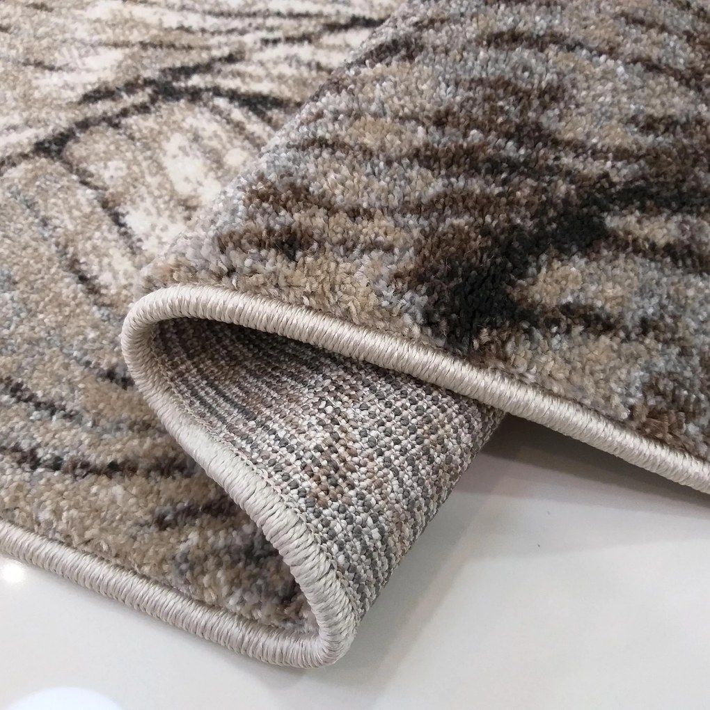 DY Hnědý moderní koberec s motivem listů Panamero 15 Rozměr: 60x100 cm