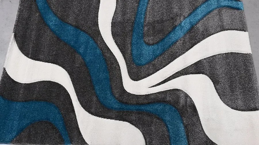 Moderní kusový koberec WAVE MERINO modrý 200x290