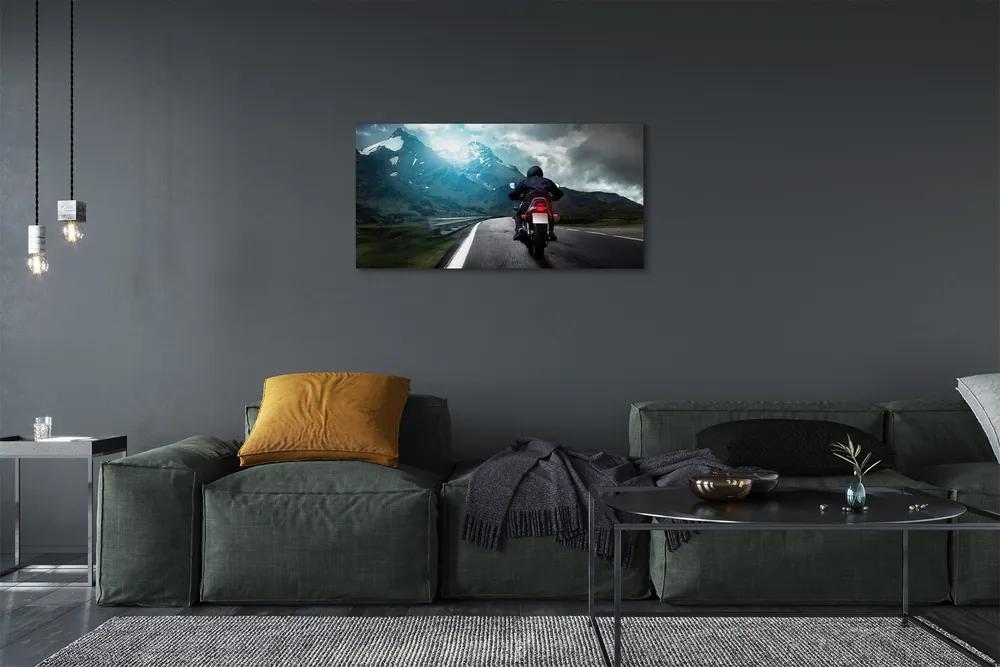 Obrazy na plátně Motocyklu horské silnici muž nebe 120x60 cm