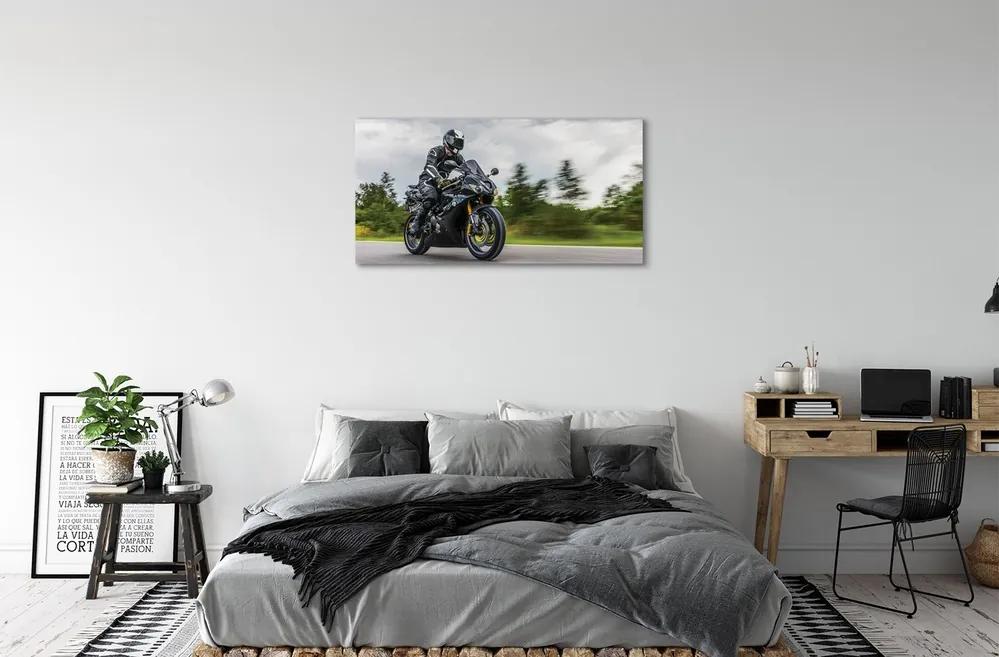 Obrazy na plátně Motocykl silnice mraky nebe 140x70 cm