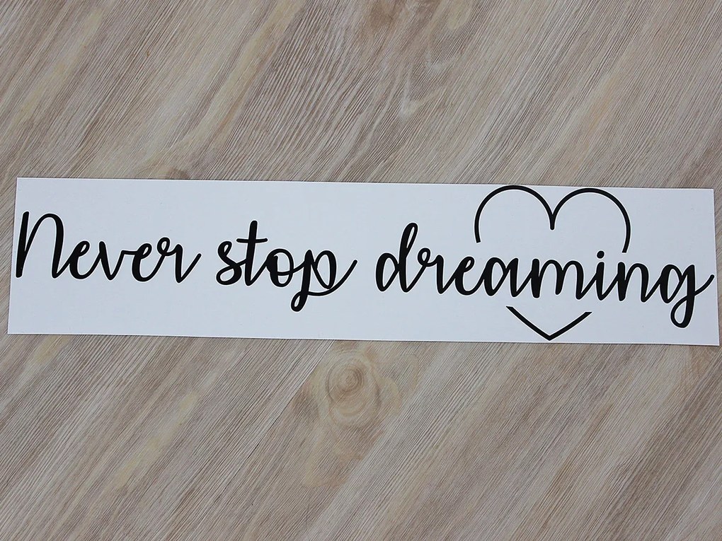 Never stop dreaming samolepka na zeď 40 x 9 cm