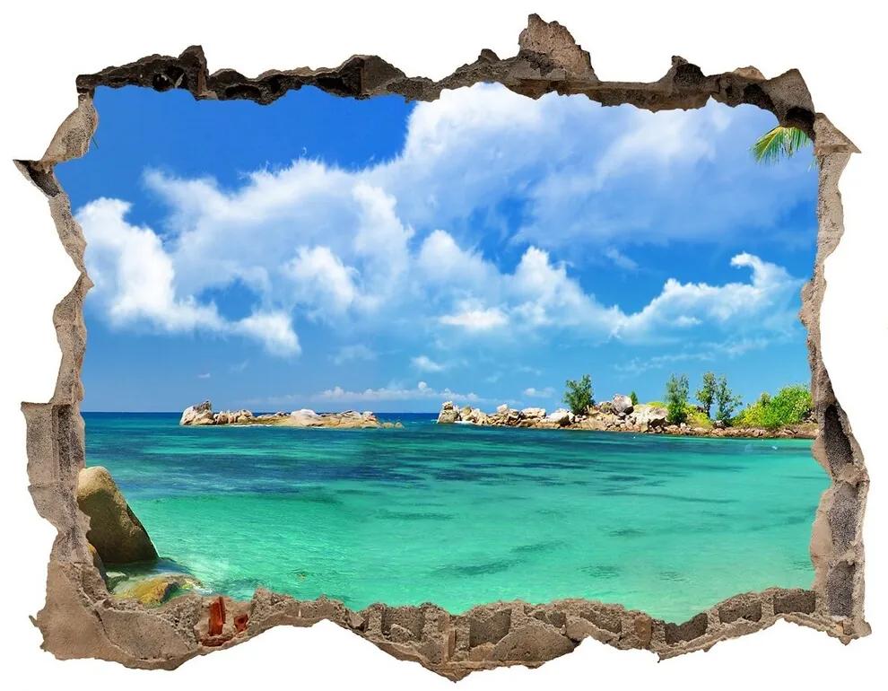 Wallmuralia Díra 3D ve zdi nálepka Seychely pláž 95x64 cm