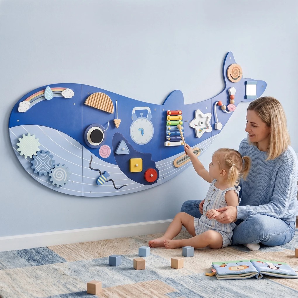 AIYAPLAY Montessori motorická deska 13v1 dřevěné Busy Board ve tvaru velryby, nástěnně montovaná herní deska s xylofonem, hodinami a ozubenými koly