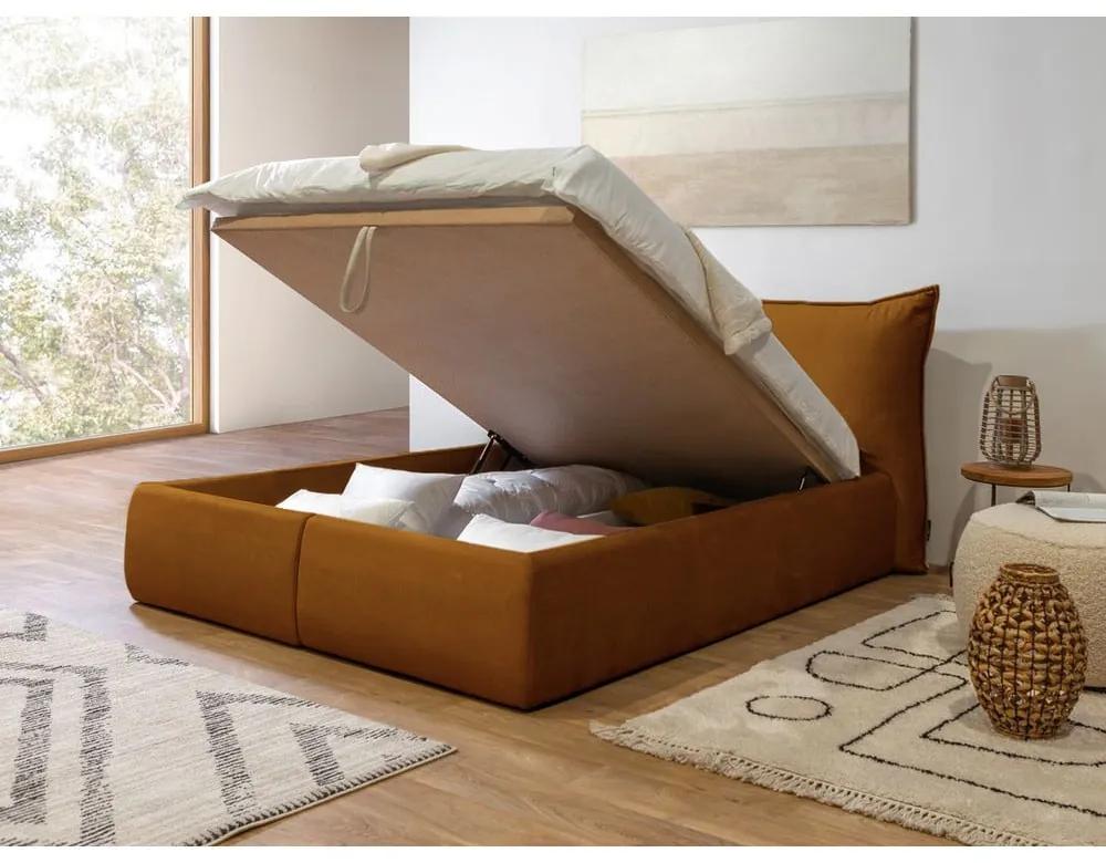 Okrově žlutá čalouněná dvoulůžková postel s úložným prostorem s roštem 180x200 cm Jade – Bobochic Paris