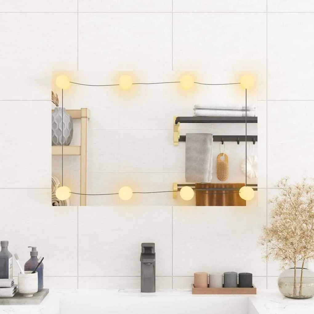 Nástěnné zrcadlo s LED osvětlením 40 x 60 cm sklo obdélníkové 3189152