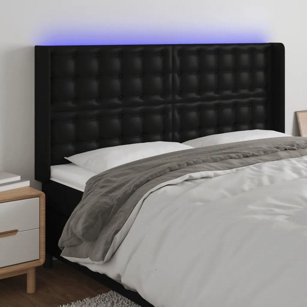 Čelo postele s LED černé 147 x 16 x 118/128 cm umělá kůže