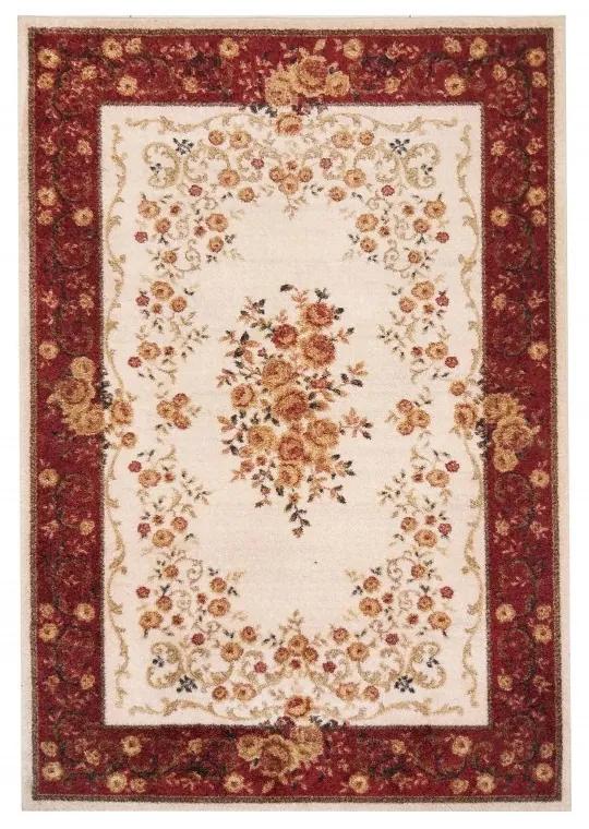Rustikální béžově červený koberec s květinami