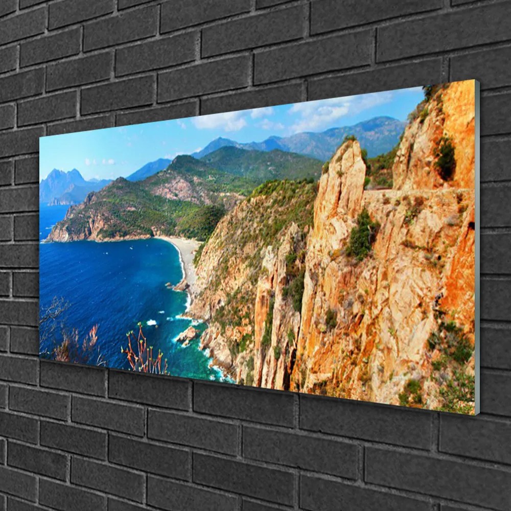Obraz na skle Útes Pobřeží Moře Hory 100x50 cm