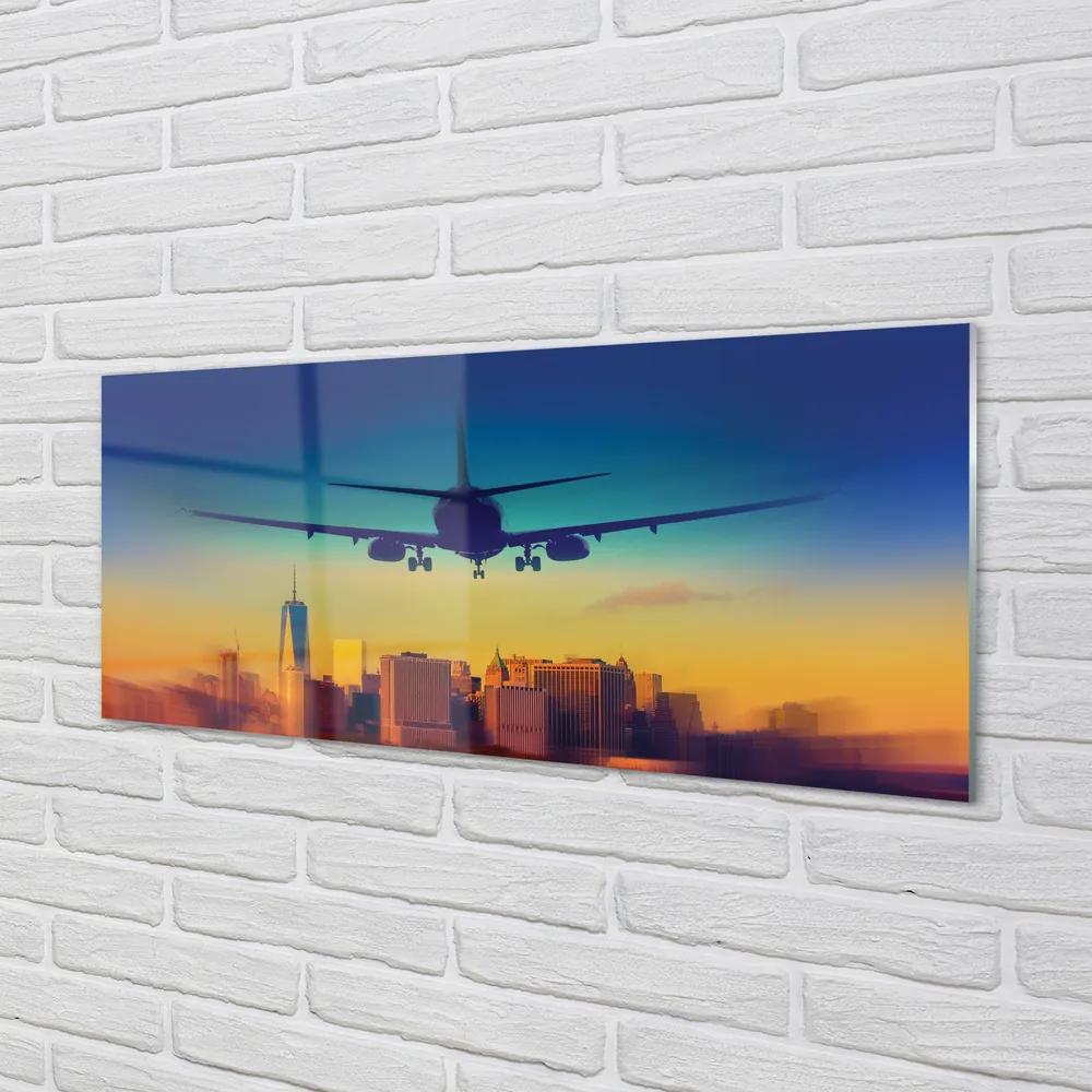 akrylový obraz Velkoměsto oblačnosti letadlo západ 120x60 cm