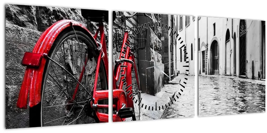 Obraz červeného kola na dlážděné ulici (s hodinami) (90x30 cm)