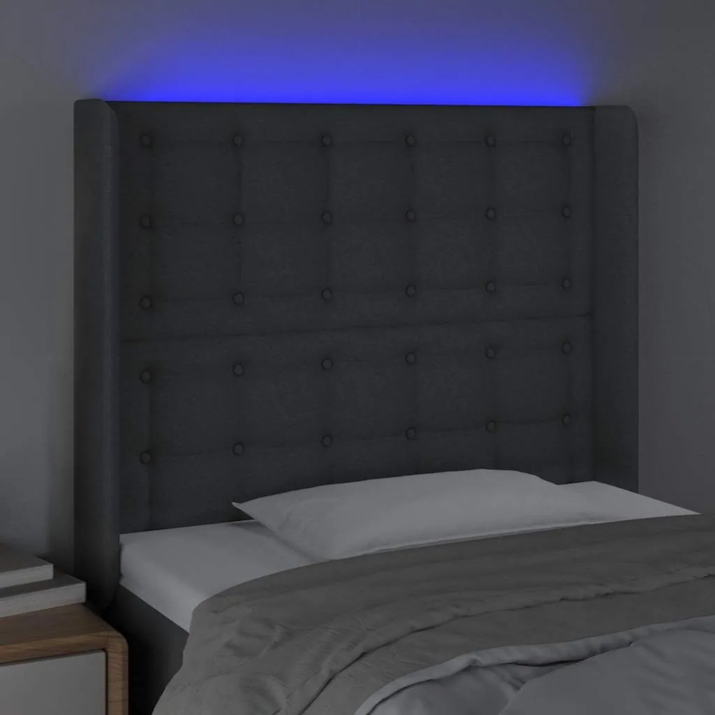 Čelo postele s LED tmavě šedé 83 x 16 x 118/128 cm textil 3124457