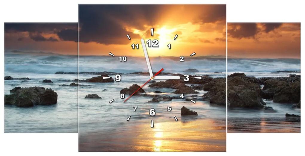 Gario Obraz s hodinami Západ slunce nad oceánem - 3 dílný Rozměry: 80 x 40 cm