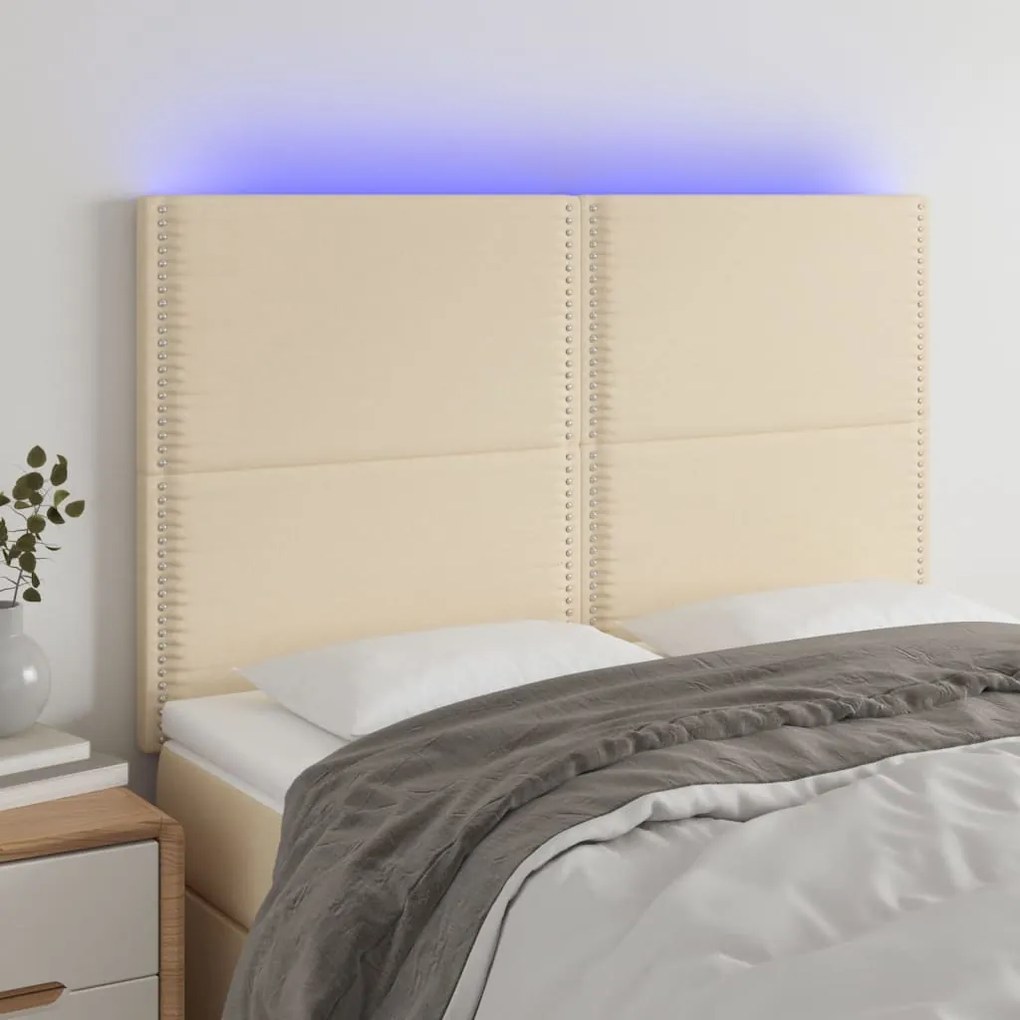 Čelo postele s LED krémové 144x5x118/128 cm textil