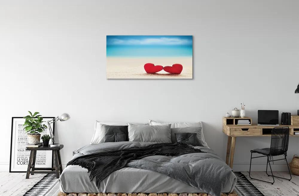 Obrazy na plátně Srdce červené písečné moře 140x70 cm