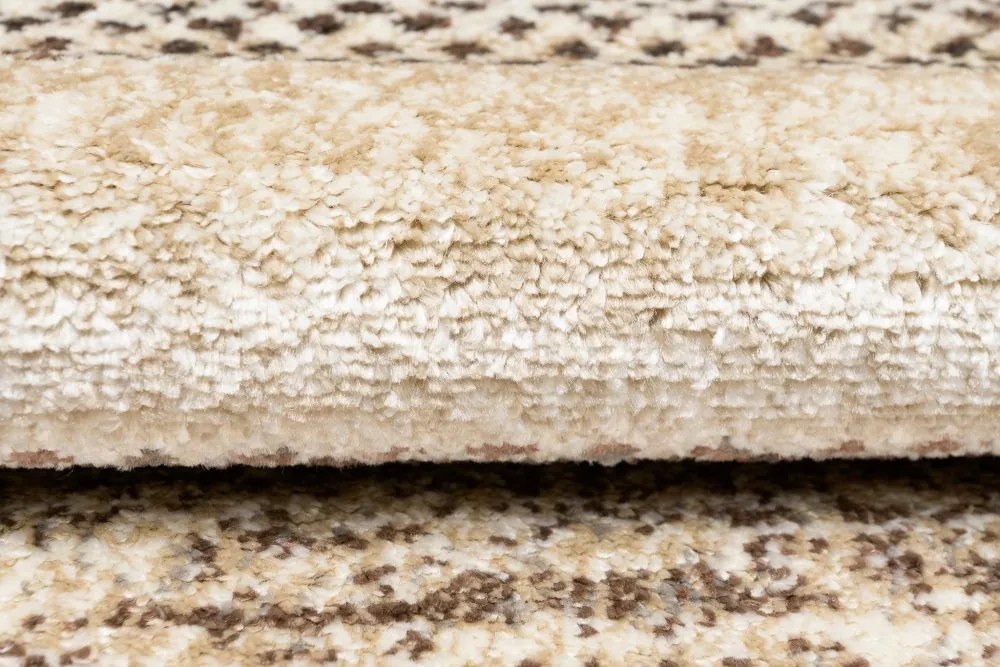 Moderní koberec s pruhy v hnědých odstínech Šířka: 120 cm | Délka: 170 cm