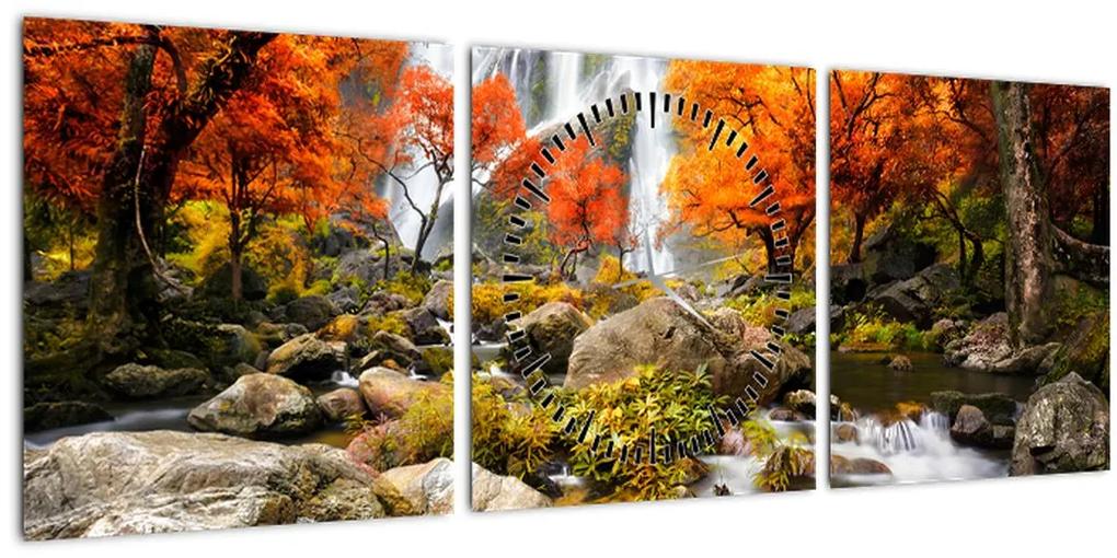 Obraz - Vodopády v oranžovém lese (s hodinami) (90x30 cm)