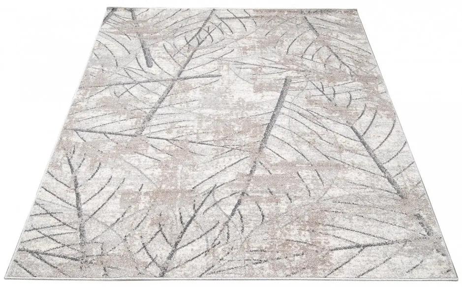 Moderní béžový koberec s motivem jemných lístků Šířka: 140 cm | Délka: 200 cm