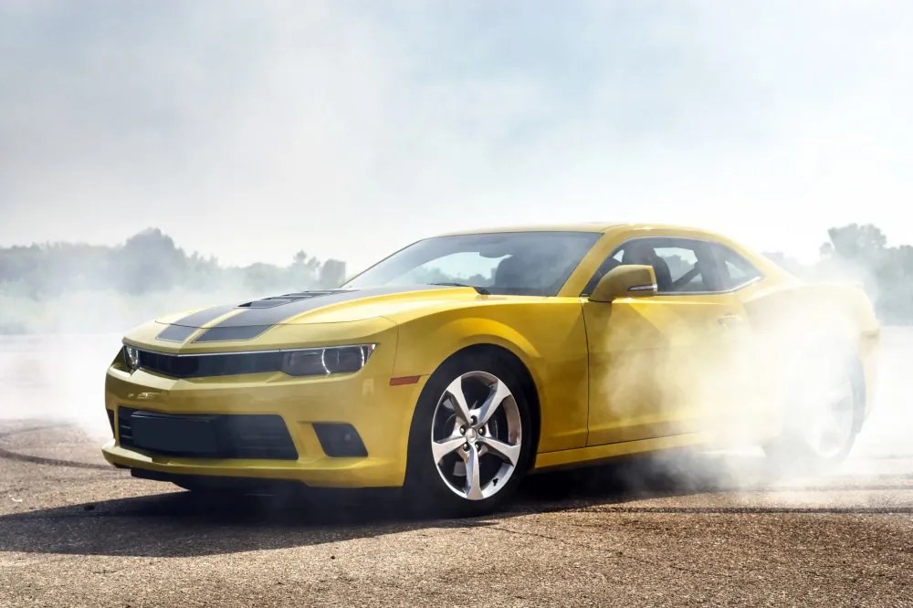 Vícedílný obraz 3D Driftující Žluté Auto Nedostatek Nedostatek Přírodní plátno 150x100