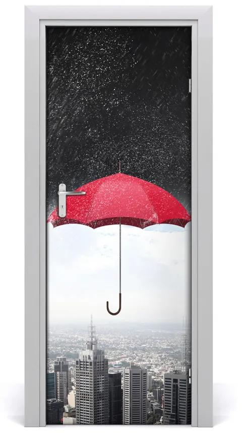 Fototapeta samolepící dveře deštník nad městem 75x205 cm