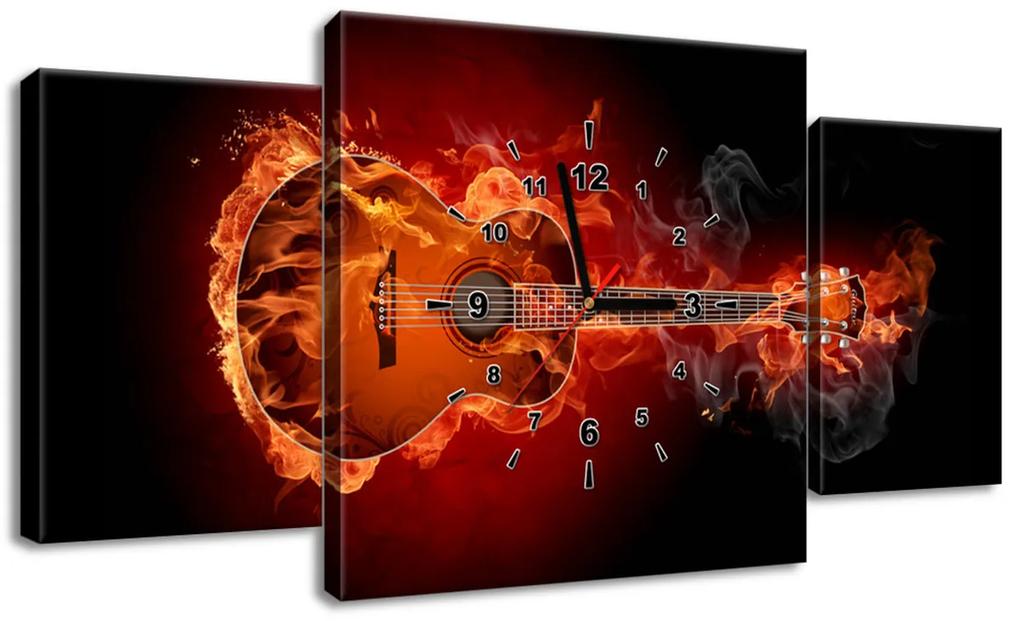 Gario Obraz s hodinami Hořící kytara - 3 dílný Rozměry: 80 x 40 cm