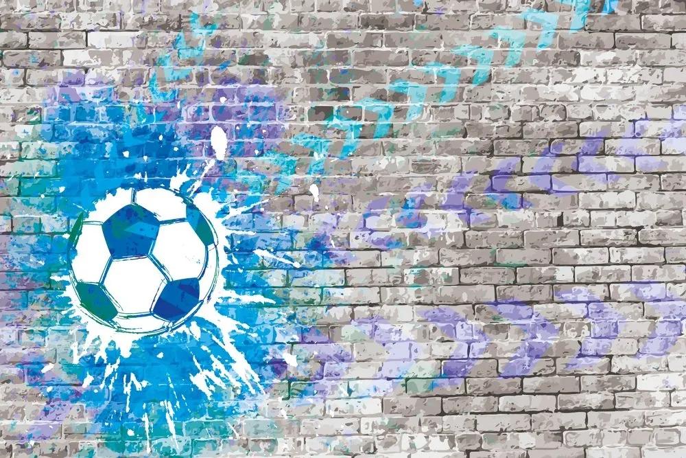 Tapeta modrý fotbalový míč na cihlové zdi - 225x270